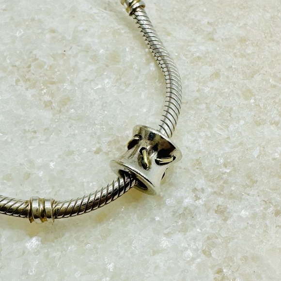 Pandora | Jewelry | Euc Pandora 79327 Sterling Silver W 4k Yellow Gold Stitches Charm | Poshmark